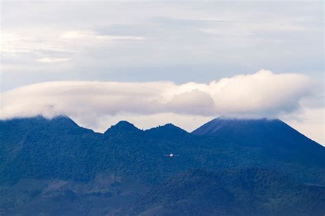 Panoramic View Of Pacaya Volcano And Plane Flying On A Clear Day With