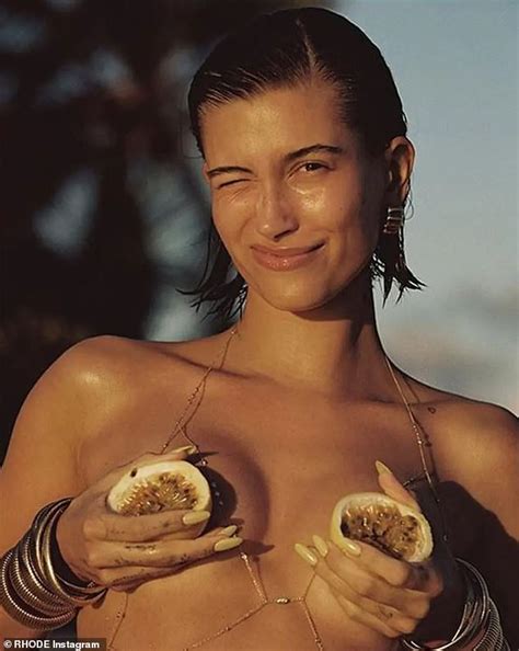 Hailey Bieber Places Pieces Of Fruit Over Her Chest Wears Gold Bra