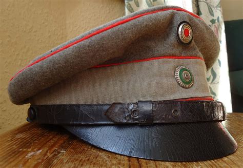 A Brief History Of The Leather Peaked Field Capotherwise