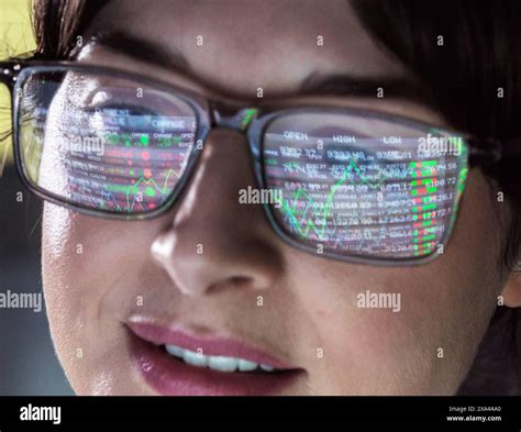 A Close Up Of A Womans Face Focusing On Her Glasses Which Reflect The