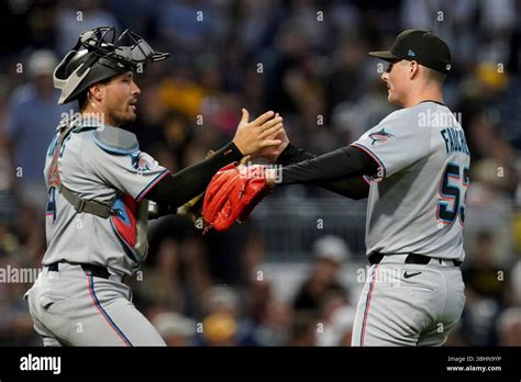 Miami Marlins Pitcher Calvin Faucher Right Celebrates With Catcher Nick Fortes Left After