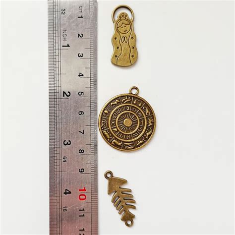 اِم جان گالری 10 گرم خرجکار زردقلم مدل اسکلت ماهی، دختر و ماه تولد وسایل ساخت زیورالات