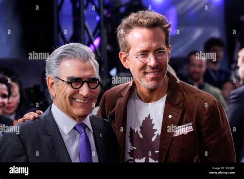 Eugene Levy Left And Ryan Reynolds Attend The Premiere Of John Candy