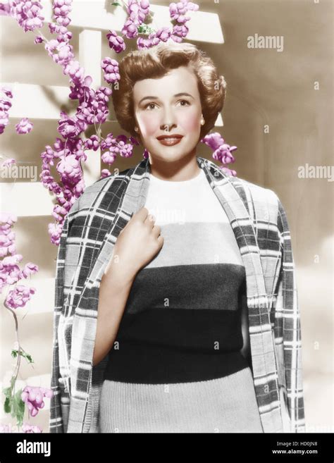 Phyllis Thaxter Models A Short Sleeve Cashmere Sweater And Wool Plaid