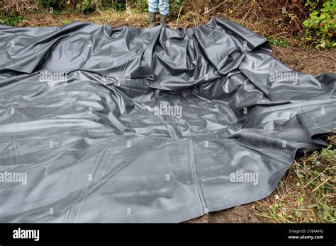 Creating And Lining A Wildlife Pond In A Garden Uk Pond Liner In Place Before Cutting To Size