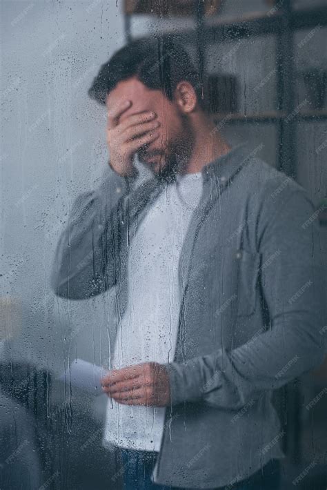 Man Crying In The Rain