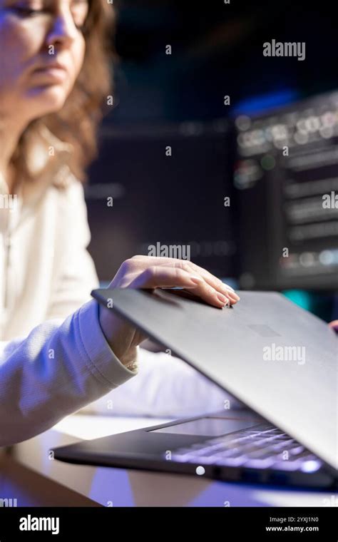 Cybersecurity Expert Using Laptop To Look For Company Security Vulnerabilities And Injected