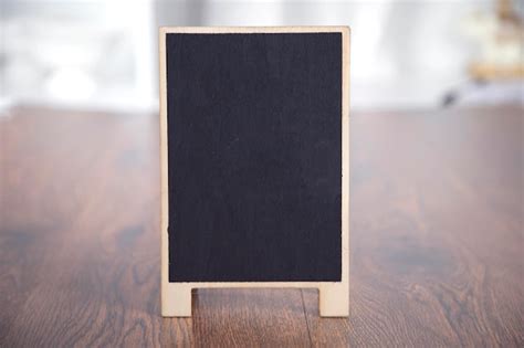 Premium Photo Chalkboard On Table