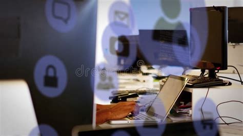 Animation Of Icons And Computer Language Over Caucasian Man Typing On Keyboard Of Laptop Stock