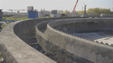 Unfinished Aeration Basin At Backdrop Of Water Treatment Facility Stock
