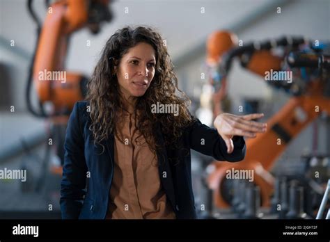 automation female engineer talking to somebody about programming