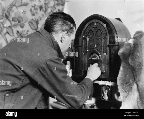 Man Tuning The Radio Stock Photo Alamy