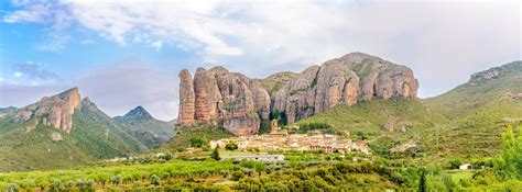 Panoramic View At The Aguero Village With Mallos De Aguero Rock