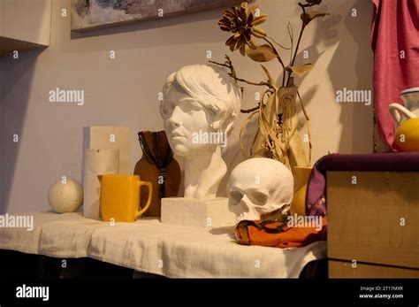 Close Up Plaster Skeleton And Objects For Drawing A Head Model On The Desk Displayed On A