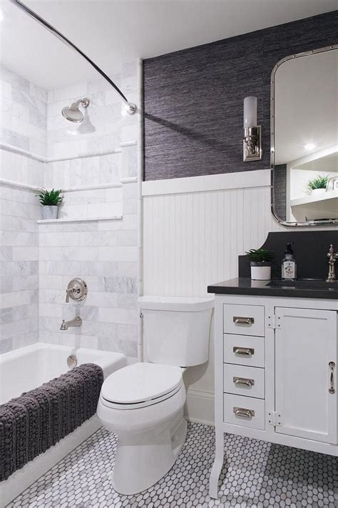 Small Bathroom With Beadboard Wainscoting And Marble Tiles Black