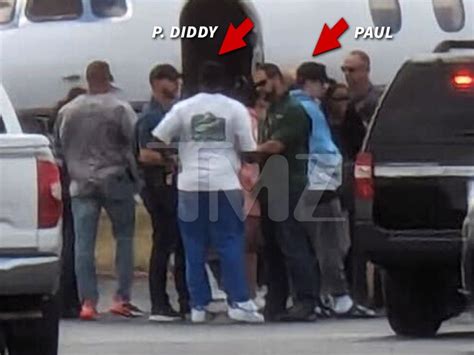 Diddy Seen Talking With Federal Agents At Airport As Associate Is Arrested