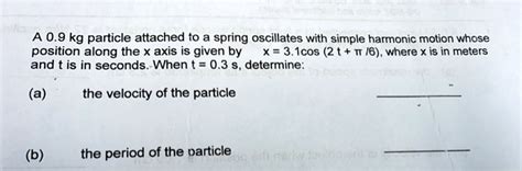 solved a 0 9 kg particle attached to a spring oscillates with simple