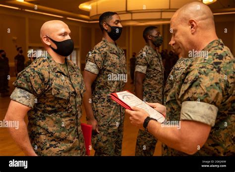 U S Marine Sgt Nathan Talbott Left A Radio Operator With The 22nd Marine Expeditionary Unit