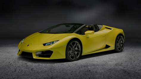Front View Of A Lamborghini Huracán Rwd Spyder Driving On A Coastal