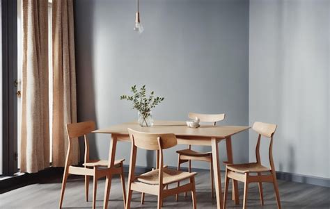 Premium Photo A Dining Room With A Wooden Table And Chairs A 3d Render By Johan Lundbye