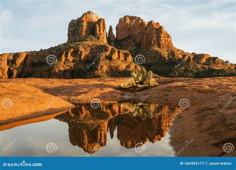 Red Rock Cathedral Rock Illuminated During Sunset Reflecting On Small