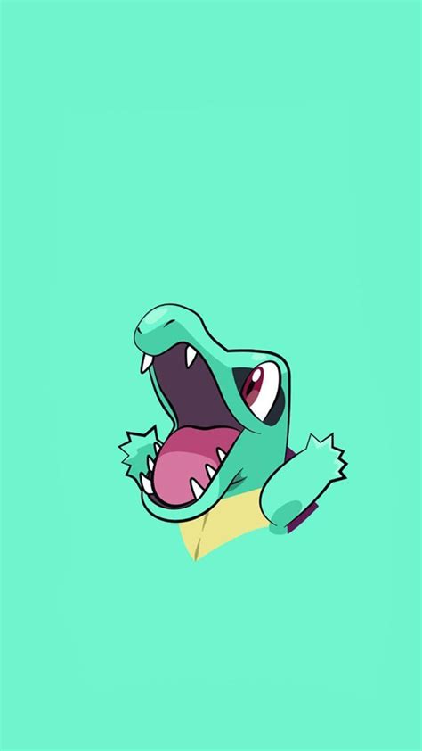 Download Totodile In Bright Teal Background Wallpaper