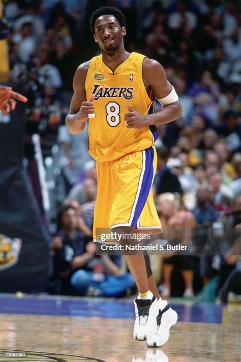 Kobe Bryant Of The Los Angeles Lakers Runs Down Court Against The