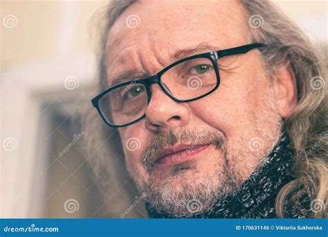 Close Up Portrait Of A White Bearded Frightened Surprised Man