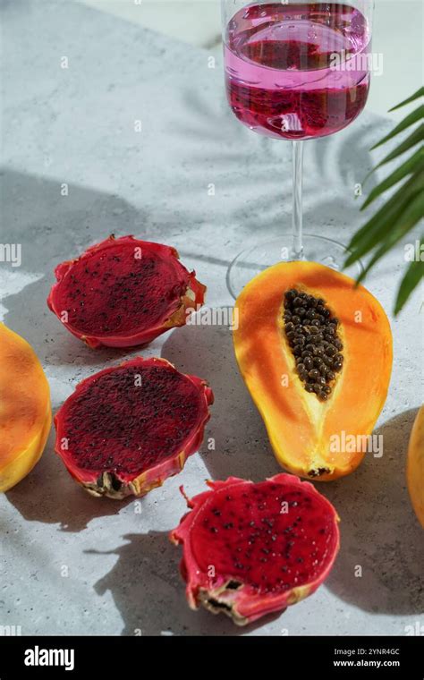 Glass With Cocktail Dragon Fruit Also Known As Pitaya Cut Open Pink Magenta Colored Flesh