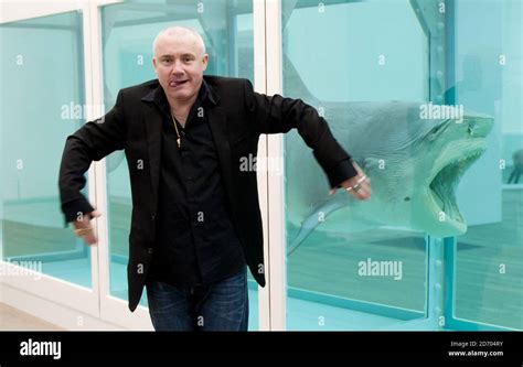 Artist Damien Hirst Pictured In Front Of His Work The Physical