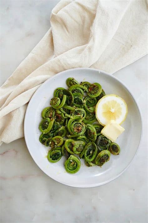 Sautéed Fiddleheads With Garlic Lemon Butter Its A Veg World After All®