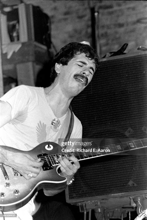 Photo Of Carlos Santana Playing Gibson Les Paul Guitar News Photo