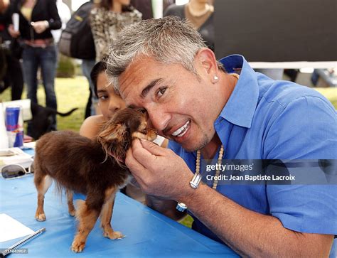 Cesar Millan And Son Calvin Millan Visit Tour For Life Adoption Event