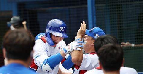 올림픽 홈런 미소