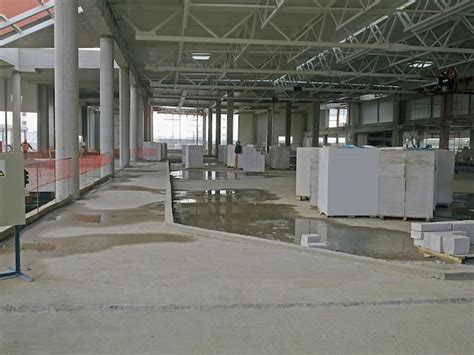 Construction Site With Wall Block Pallets And Open Structures