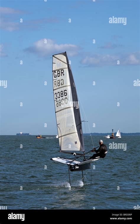 Foiling Sailing Dinghy Hydrofoil Moth Fast Speed In 10kts Of Wind Stock
