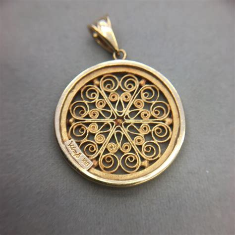 K18 ペンダントトップ 酒井公男 保証書付き メルカリ