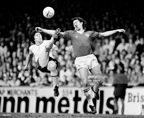 Gary Lineker Of Leicester City Clashes With Steve Perryman Of