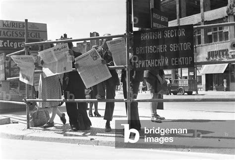 Image Of West Berliners Reading About The Announced Lifting Of The Berlin