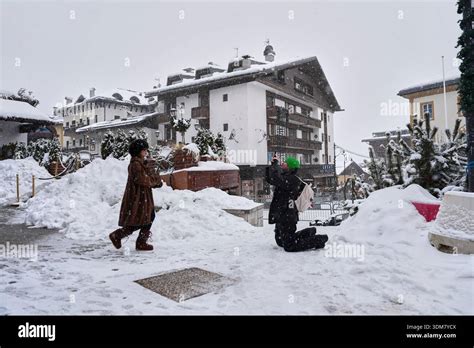 People Take A Photo Ahead Of The 2026 Winter Olympics In Cortina D