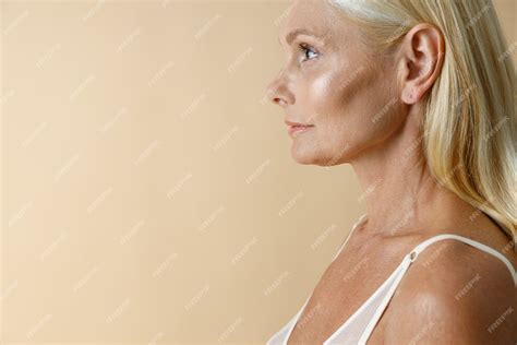 Premium Photo Side View Portrait Of Pretty Mature Blonde Woman In