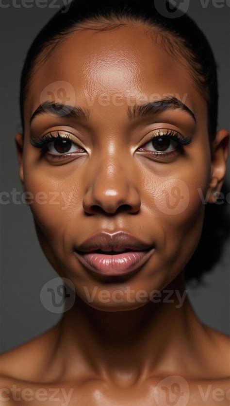 Closeup Image Featuring An African American Woman With Intricate Golden