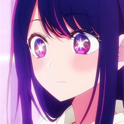 A Close Up Of A Person With Long Hair And Blue Eyes Looking At The Camera