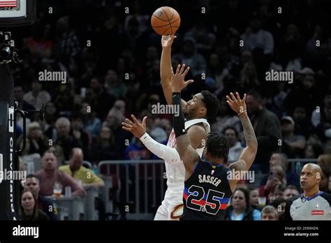 Cleveland Cavaliers Guard Donovan Mitchell Left Shoots In Front Of