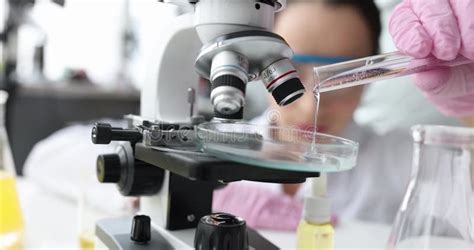 Examination Of Liquid With On Glass Under A Microscope Stock Video