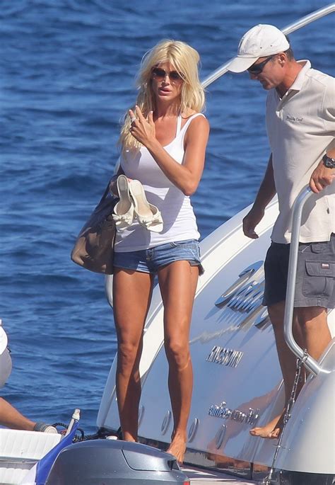 Victoria Silvstedt Flashing Her Shaved Pussy While Sunbathing In Bikini