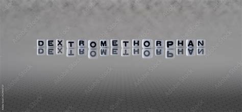 Dextromethorphan Word Or Concept Represented By Black And White Letter Cubes On A Grey Horizon