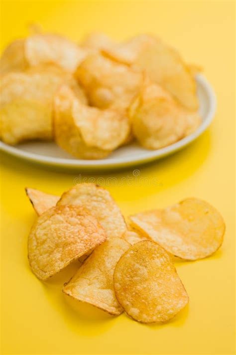 Crispy Potato Chips On Yellow Background Stock Image Image Of Crunchy