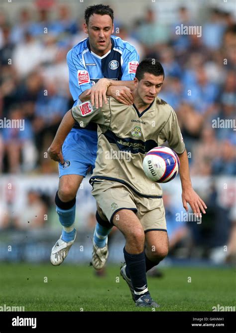 Wycombe Wanderers Scott Oakes And Stockport Countys Gary Dicker Stock