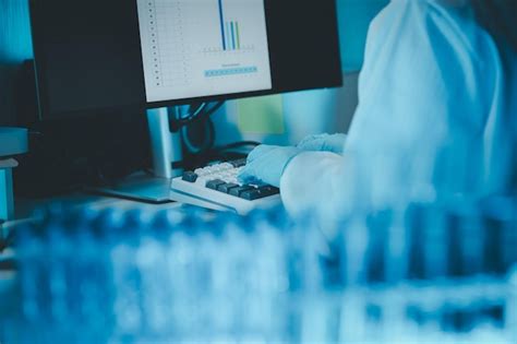 Premium Photo Chemist Taking Notes On Research Data Scientist Is